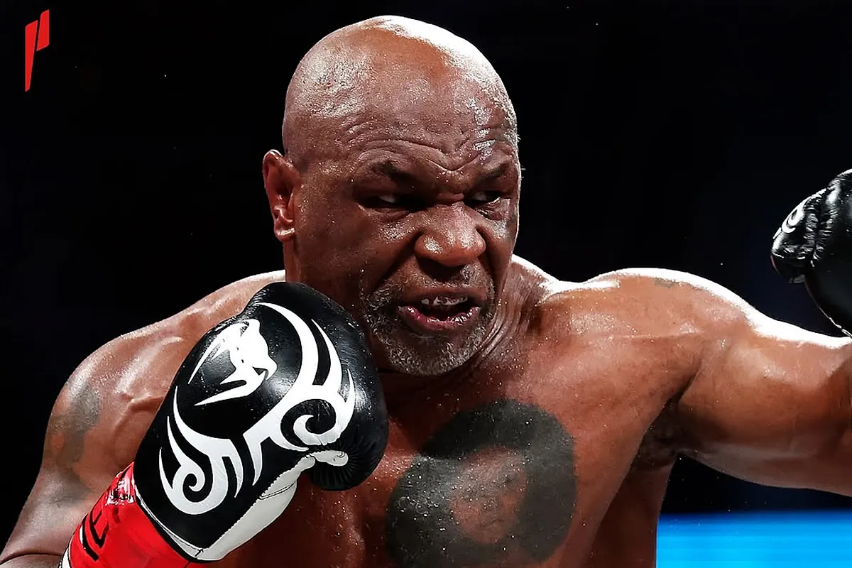 Mike Tyson takes off his shirt and starts a street fight in one of ...